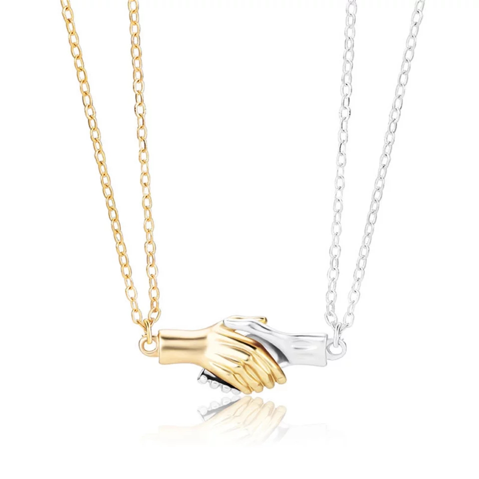 Collares manos tomadas con imanes plata/dorado