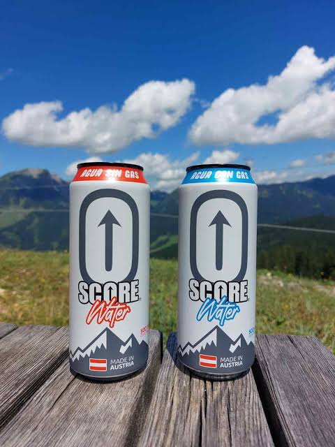Agua en lata 500 cc score con o sin gas