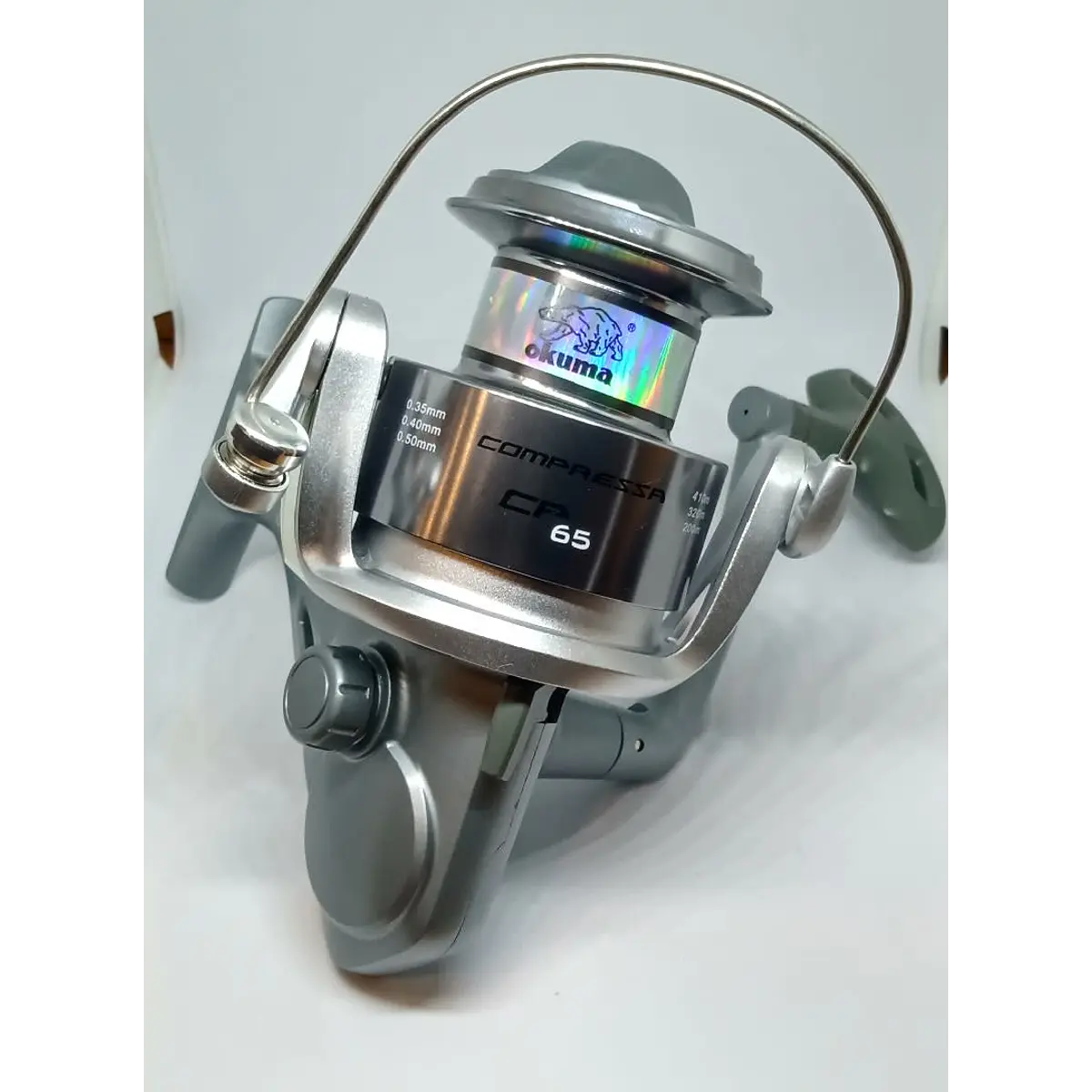 OKUMA COMPRESSA CP65 | Caza & Pesca Balthunter