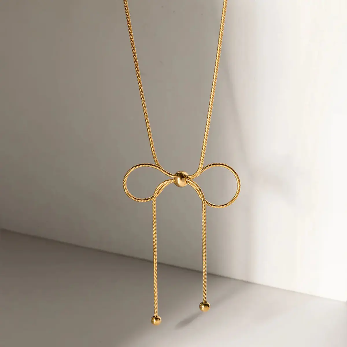 Collar Lazo Coquette Nudo - Acero Inoxidable Bañado Oro 18k
