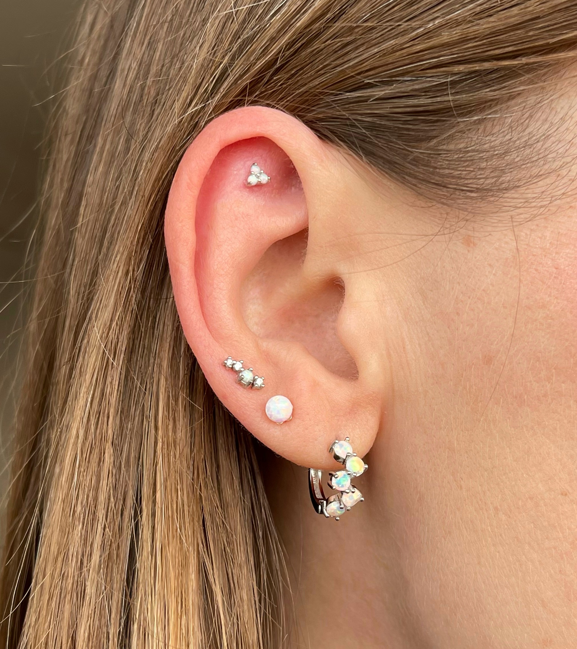 Piercing mini triángulo