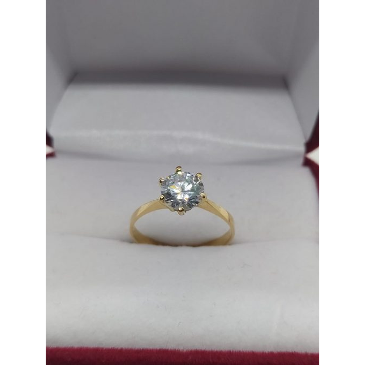 Anillo solitario circón 6 grifas 2.4 grs Oro 18k