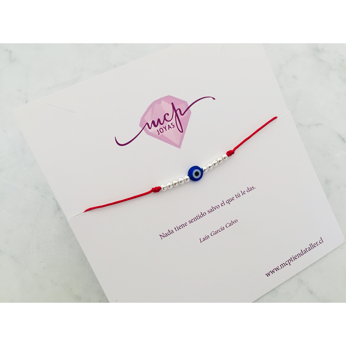 Pulsera ojo turco regulable con bolitas de plata