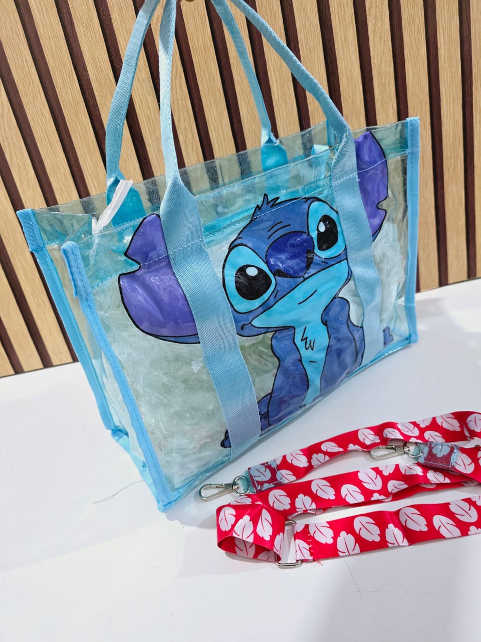 BOLSO TRANSPARENTE TIPO MALETA AZUL CIELO DISEÑO STITCH MOD#