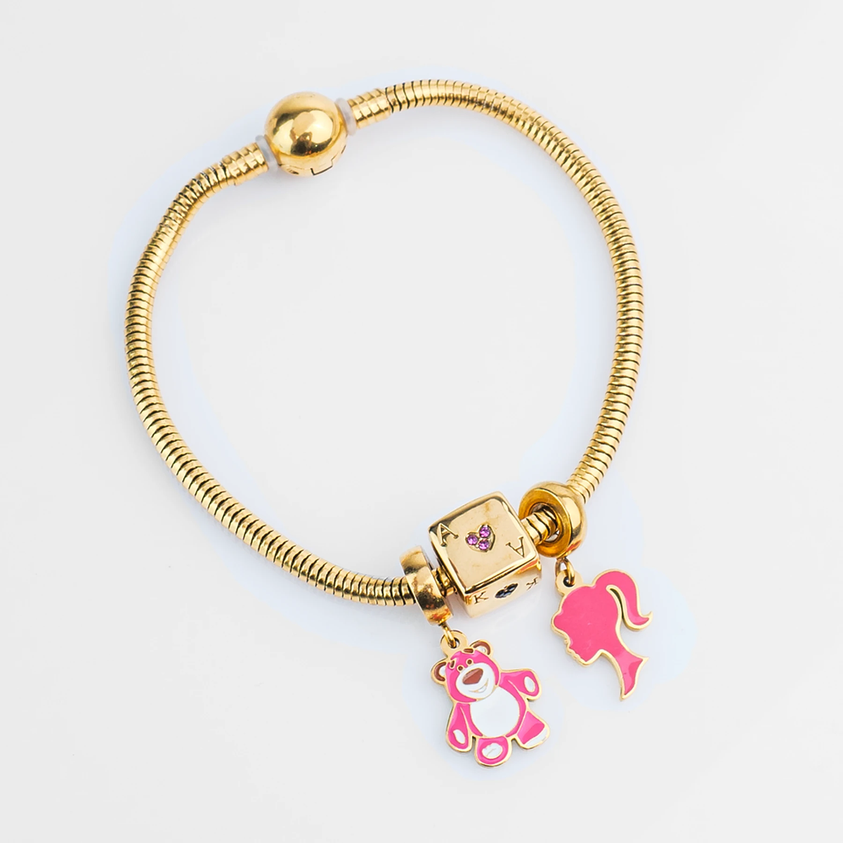 Pulsera tipo pandora Barbie y Lotso 3 charms cierre redondo