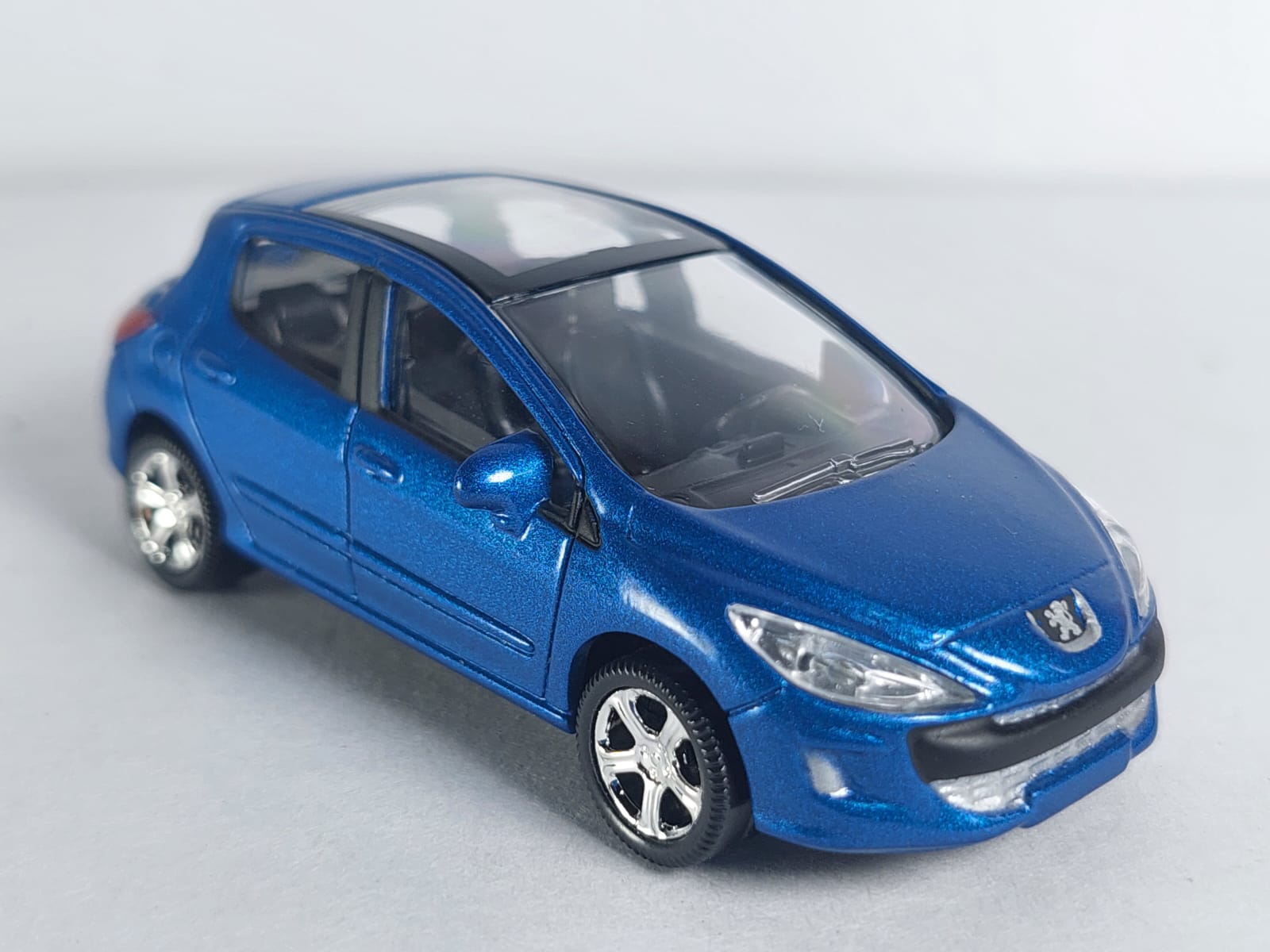 Peugeot 308 azul Escala 1/64, Marca Norev